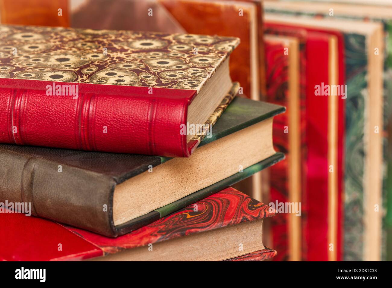 Stack of old books with ancient bindings Stock Photo - Alamy