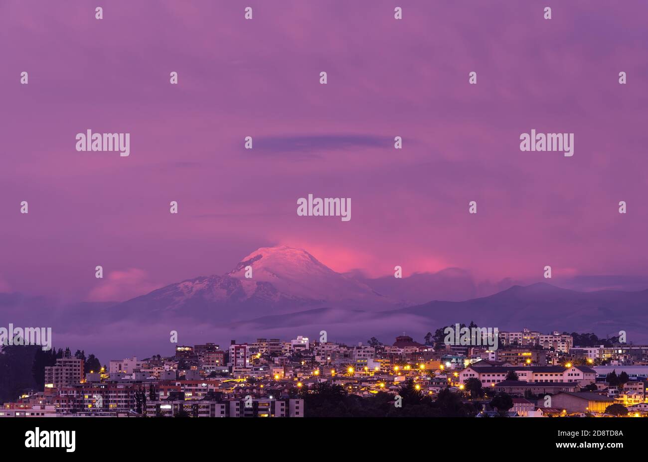 Cayambe volcano at sunset with Quito city aerial cityscape, Ecuador ...