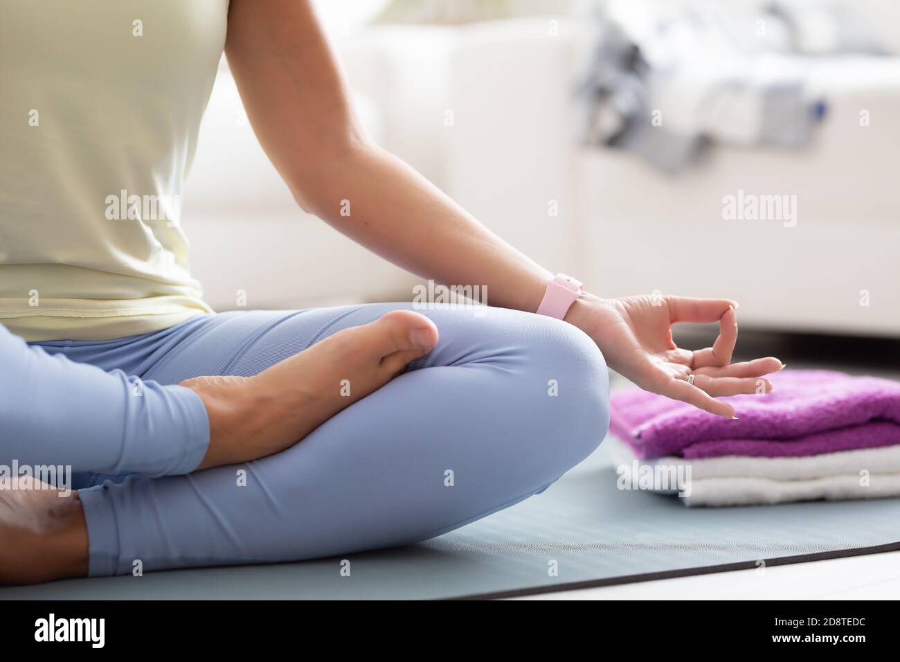 Detail of hand and feet of a lotus position of a meditating woman Stock ...