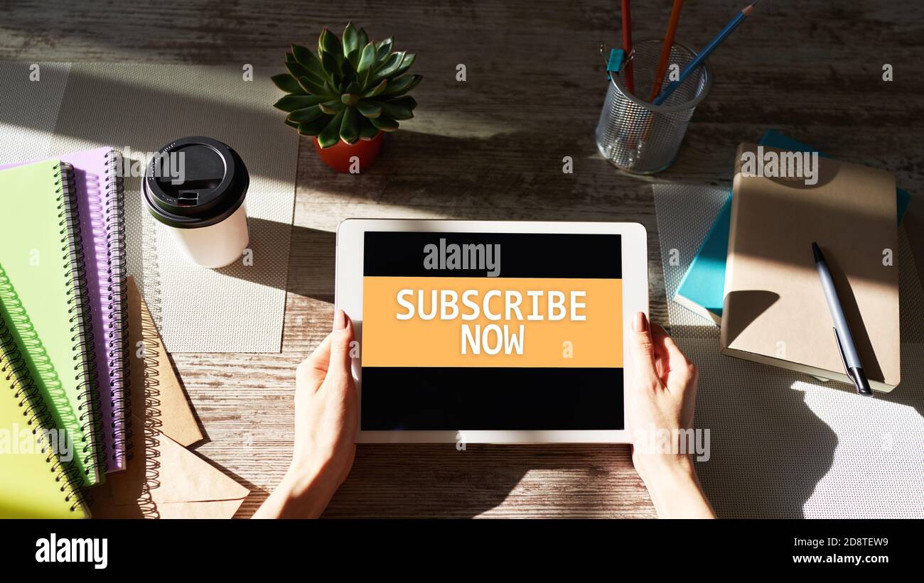 Subscribe button on device screen. Internet and digital marketing ...