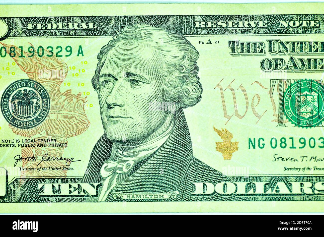 Top view shot of a ten-dollar banknote isolated on a white background ...