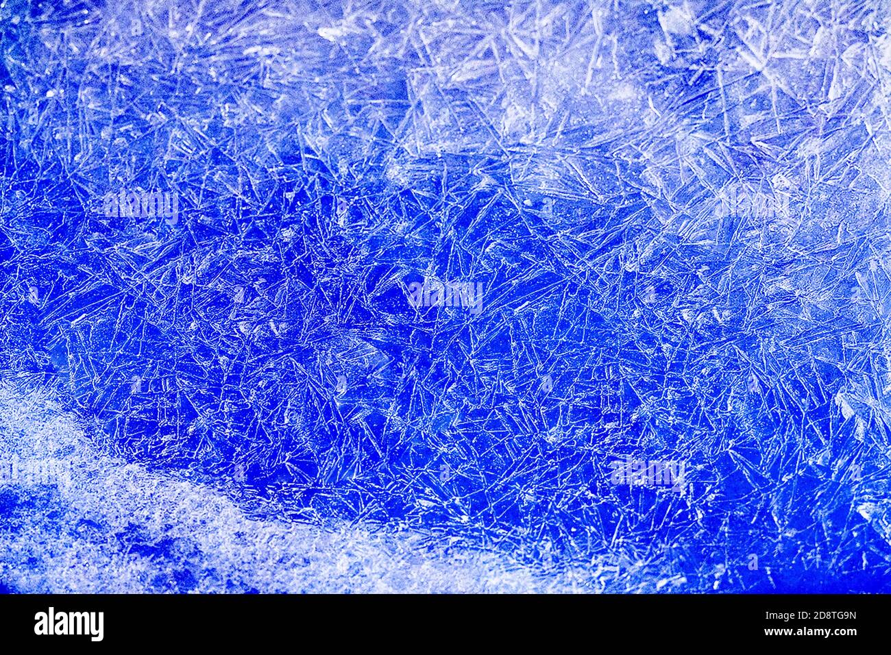 Abstract blue winter background with ice crystals. Blank surface for a ...