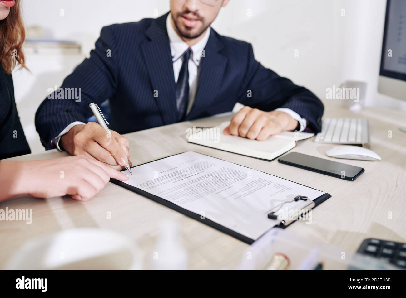 Businessman businesswoman discussing signing contract hi-res stock ...