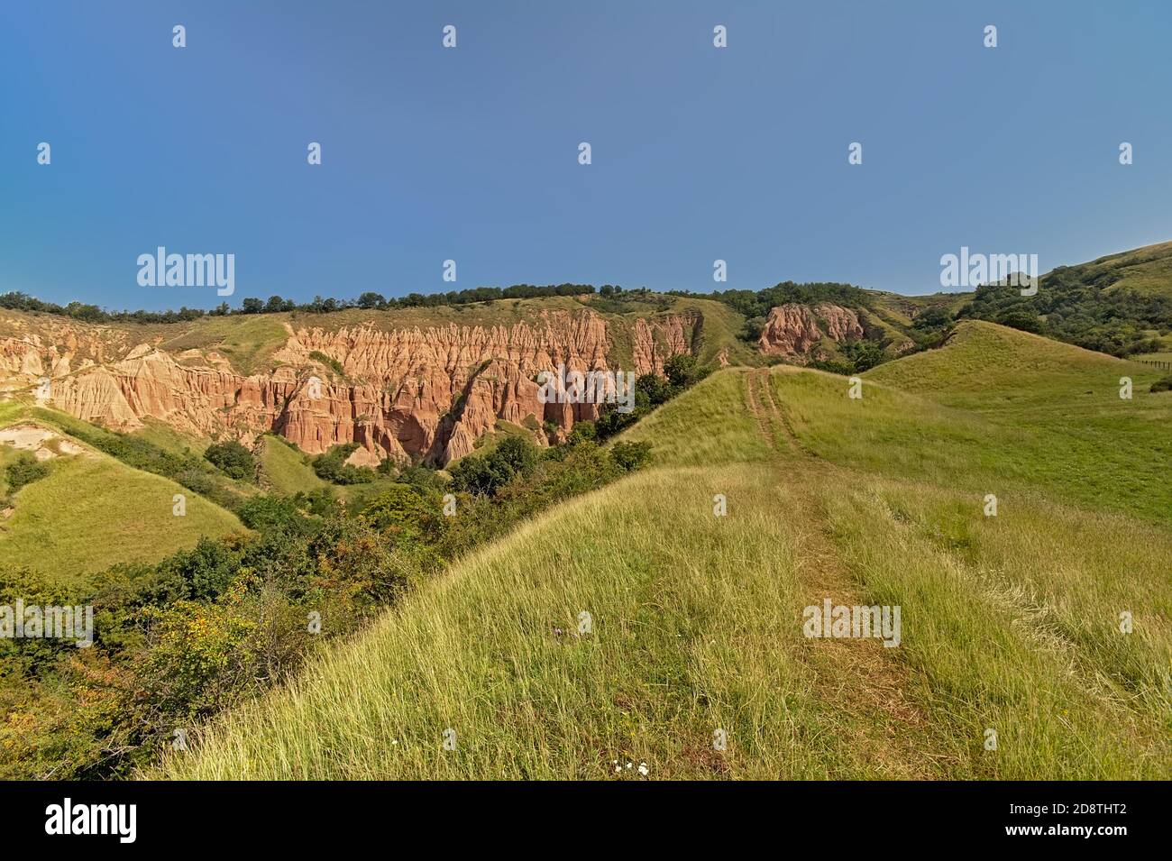 Hiking trail towards the rocks of Rapa Rosie geologic formation, the ...