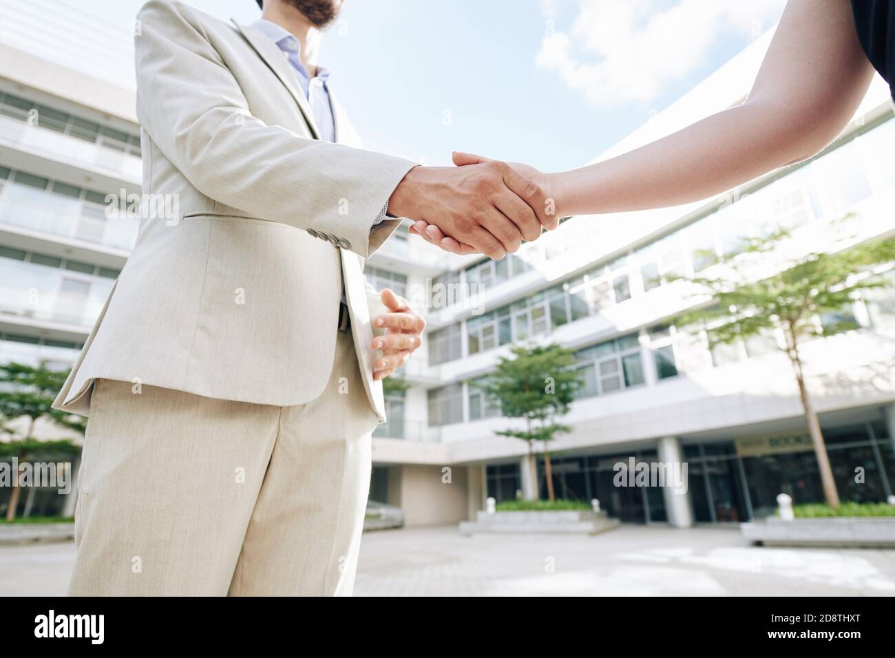 Firm handshake concept Stock Photo - Alamy