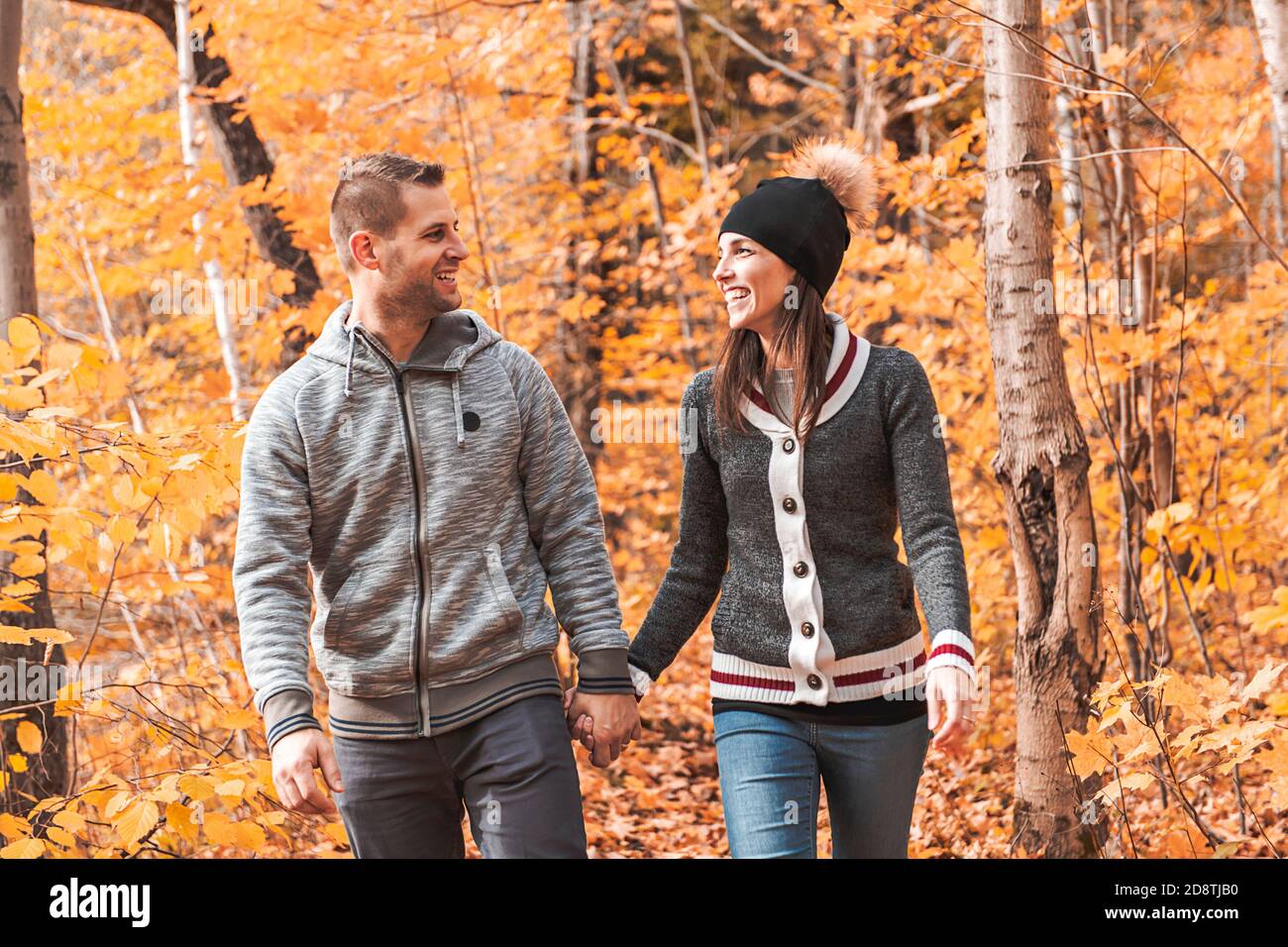 happy autumn fall couple in a park Stock Photo - Alamy