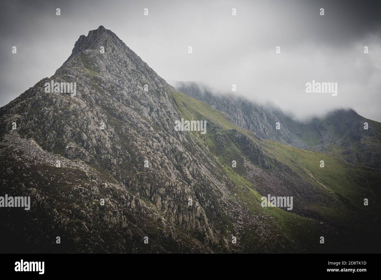 Cloud covered mountain. Tryfan in the Glyderau range in Snowdonia ...