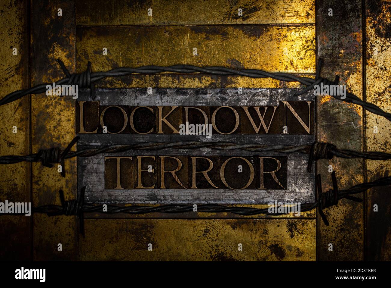 Lockdown Terror text message on textured grunge copper and vintage gold ...