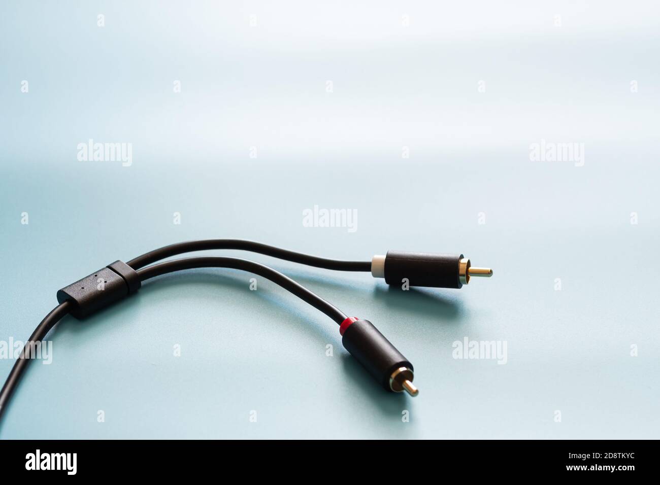 AV splitter cable connector and copy space on blue background color ...