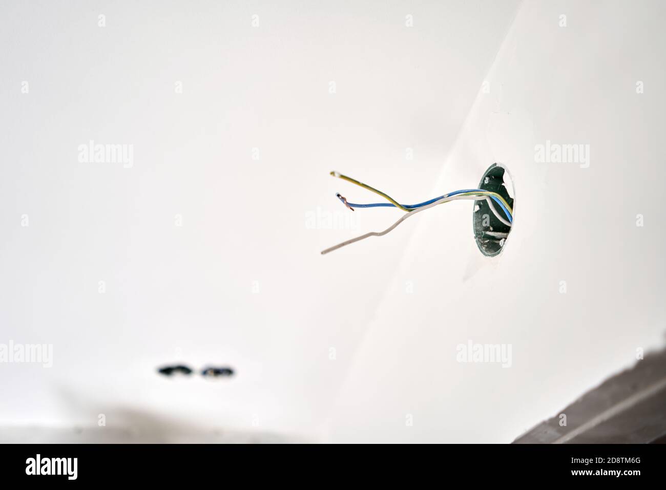 Two sockets. Installation high voltage. Electrical wires sticking out ...