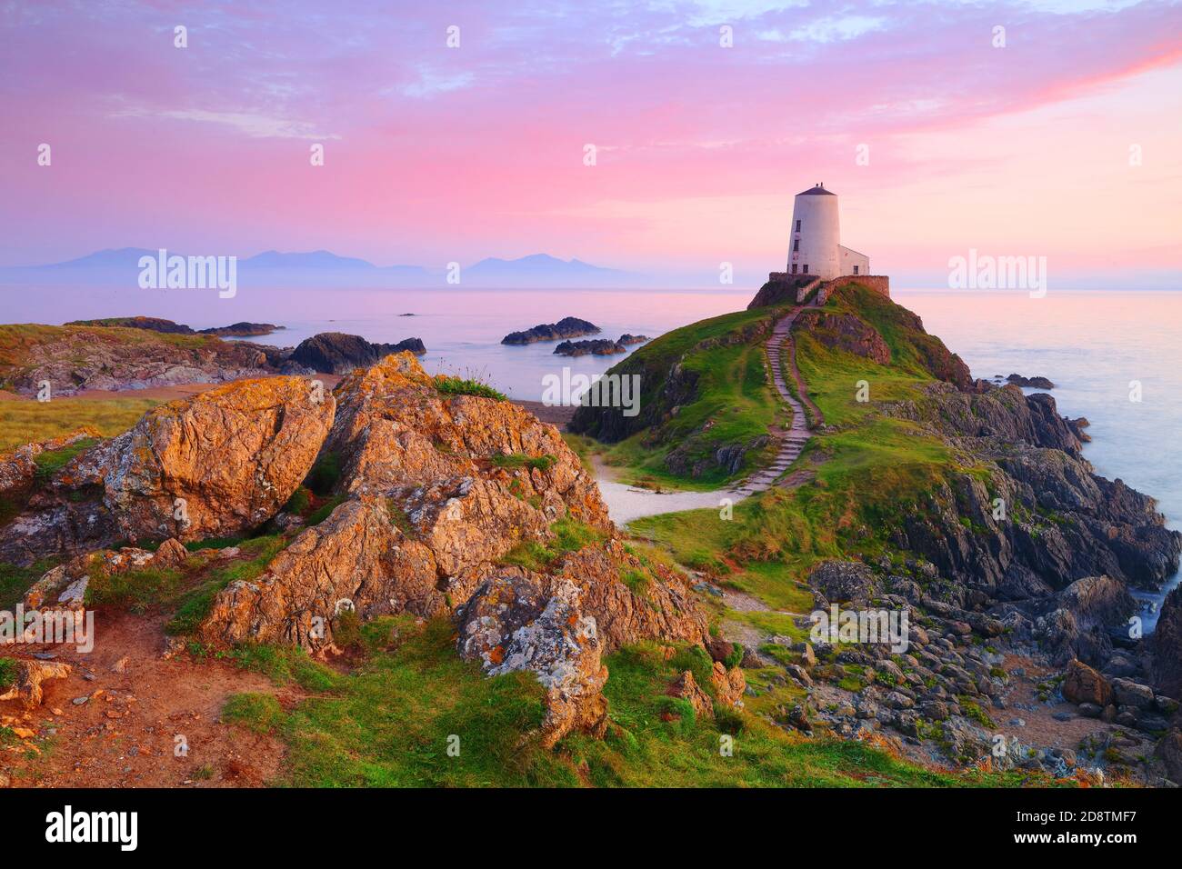 Twr Mawr Lighthouse, Llanddwyn Island at sunset, Anglesey, North Wales ...