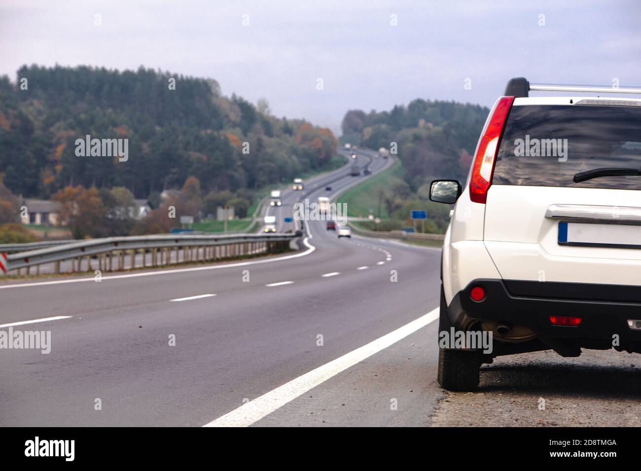 parked car on roadside of highway Stock Photo - Alamy