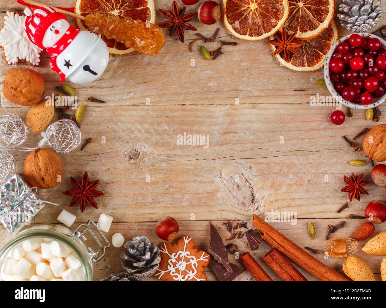Culinary Christmas background of nuts (hazelnuts, walnuts, almonds ...