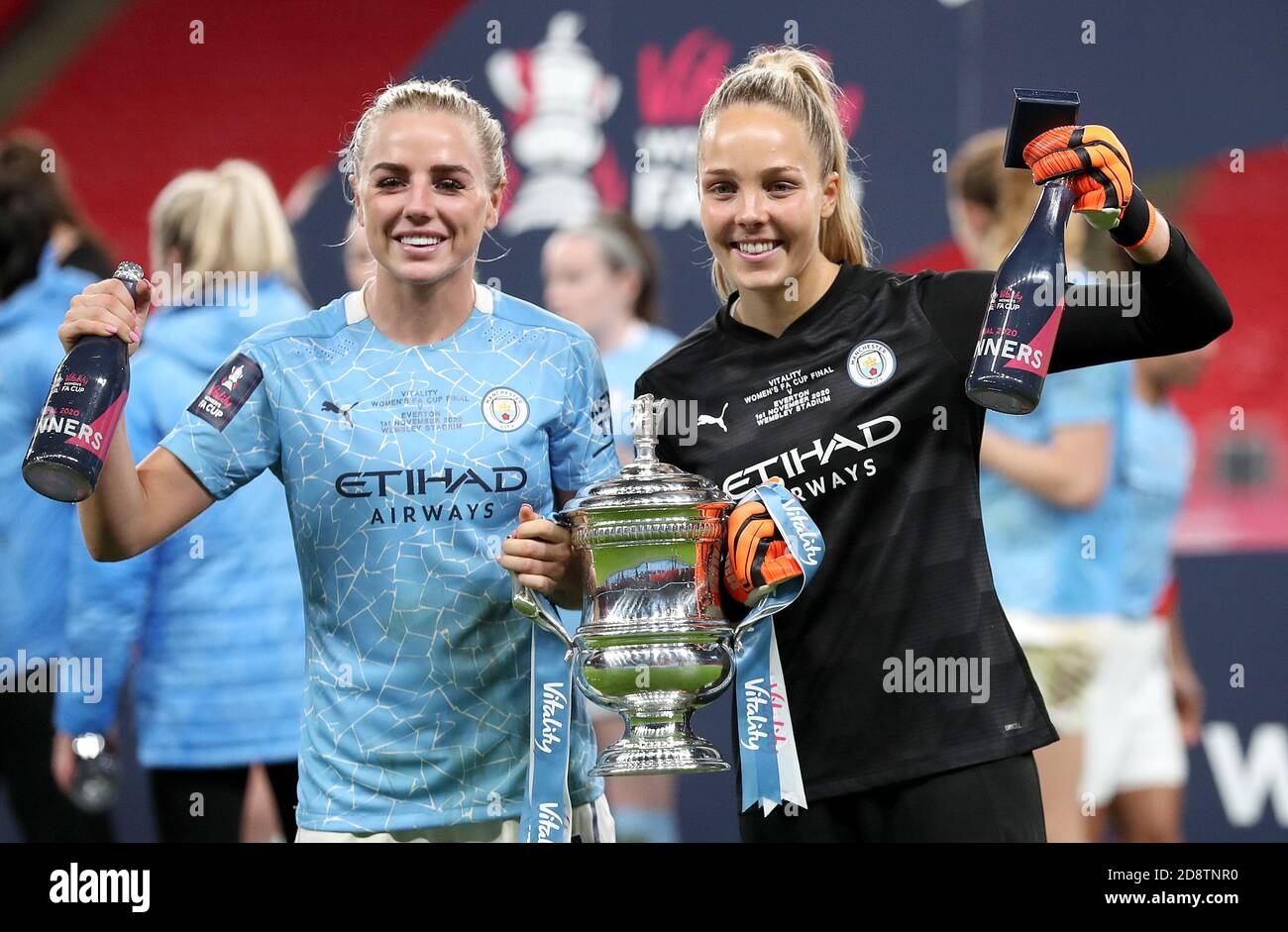 Manchester Citys Alex Greenwood And Ellie Roebuck Pose With The Trophy