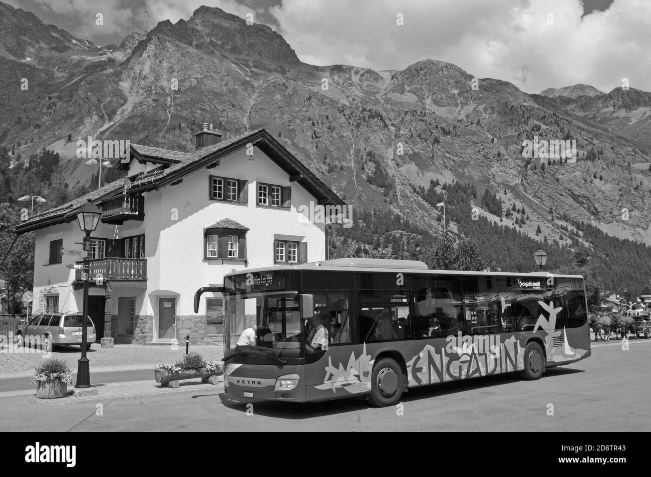 Swiss alps: The Engadin Bus in Sils-Maria mountain village in the upper ...