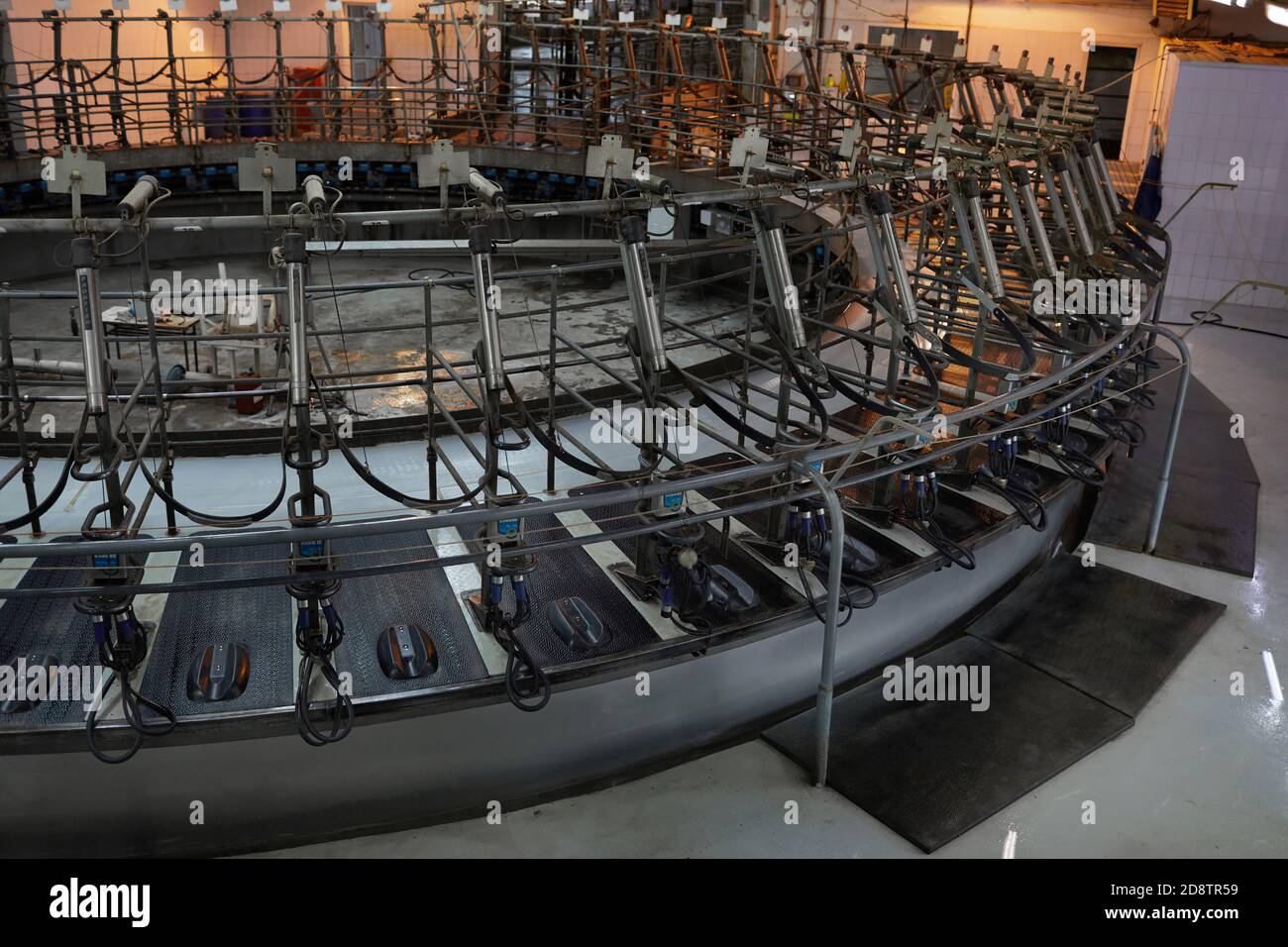 High angle background image of industrial cow milking machine at dairy ...