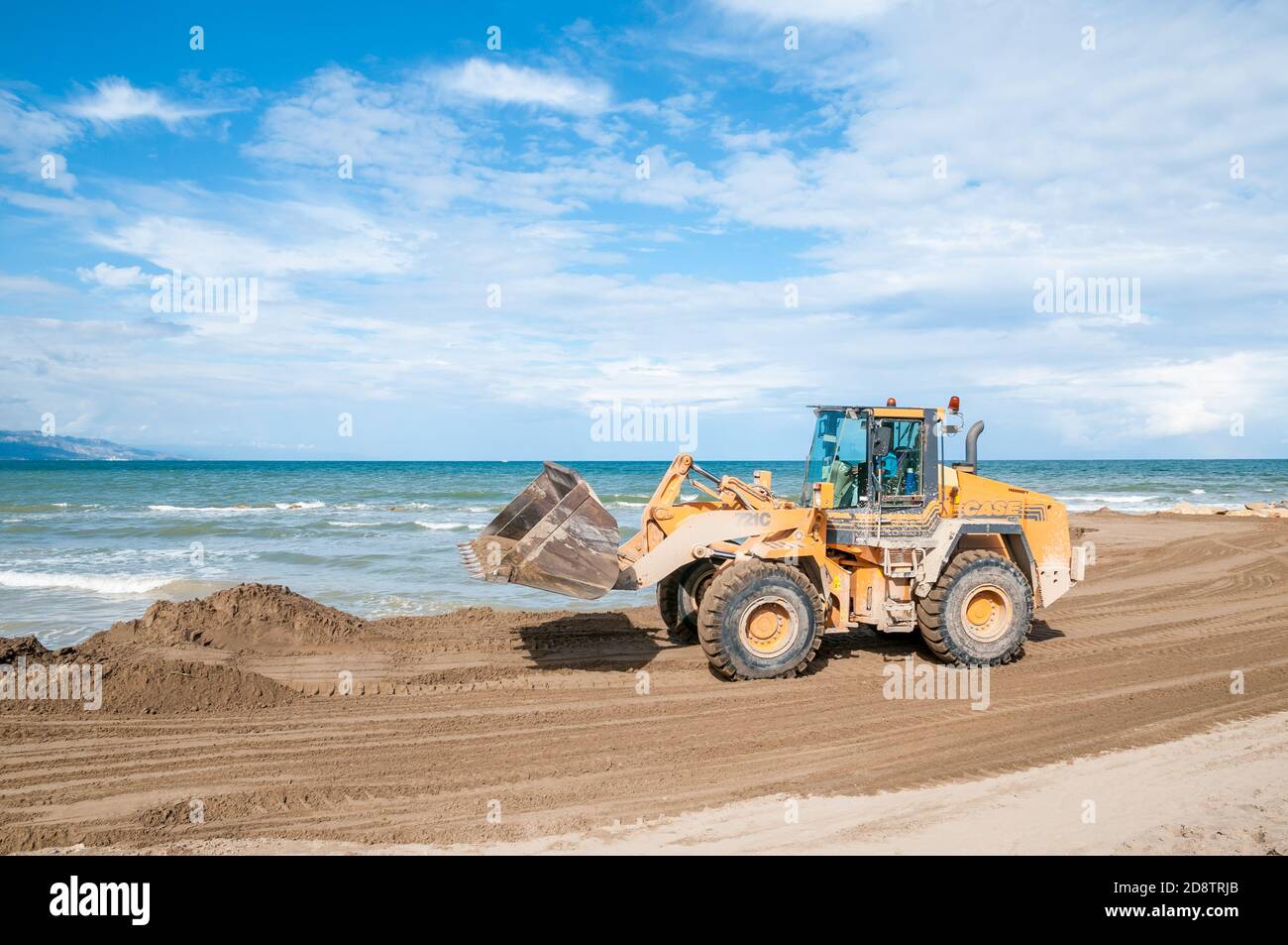 front loader working, beach restoration, placement of sand, in Ebro ...