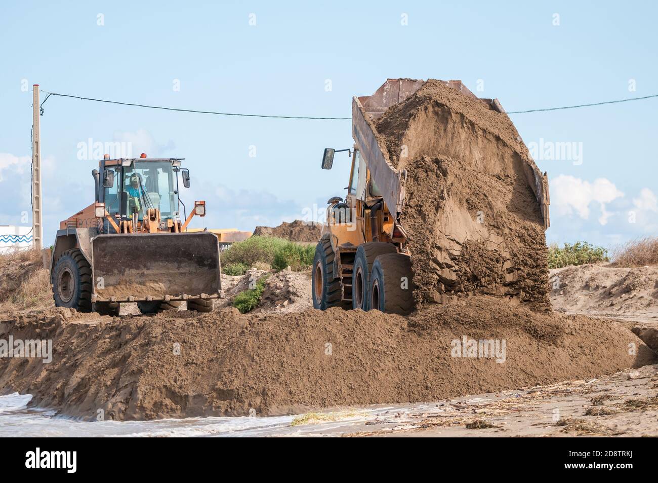 Dump truck unloading sand hi-res stock photography and images - Alamy
