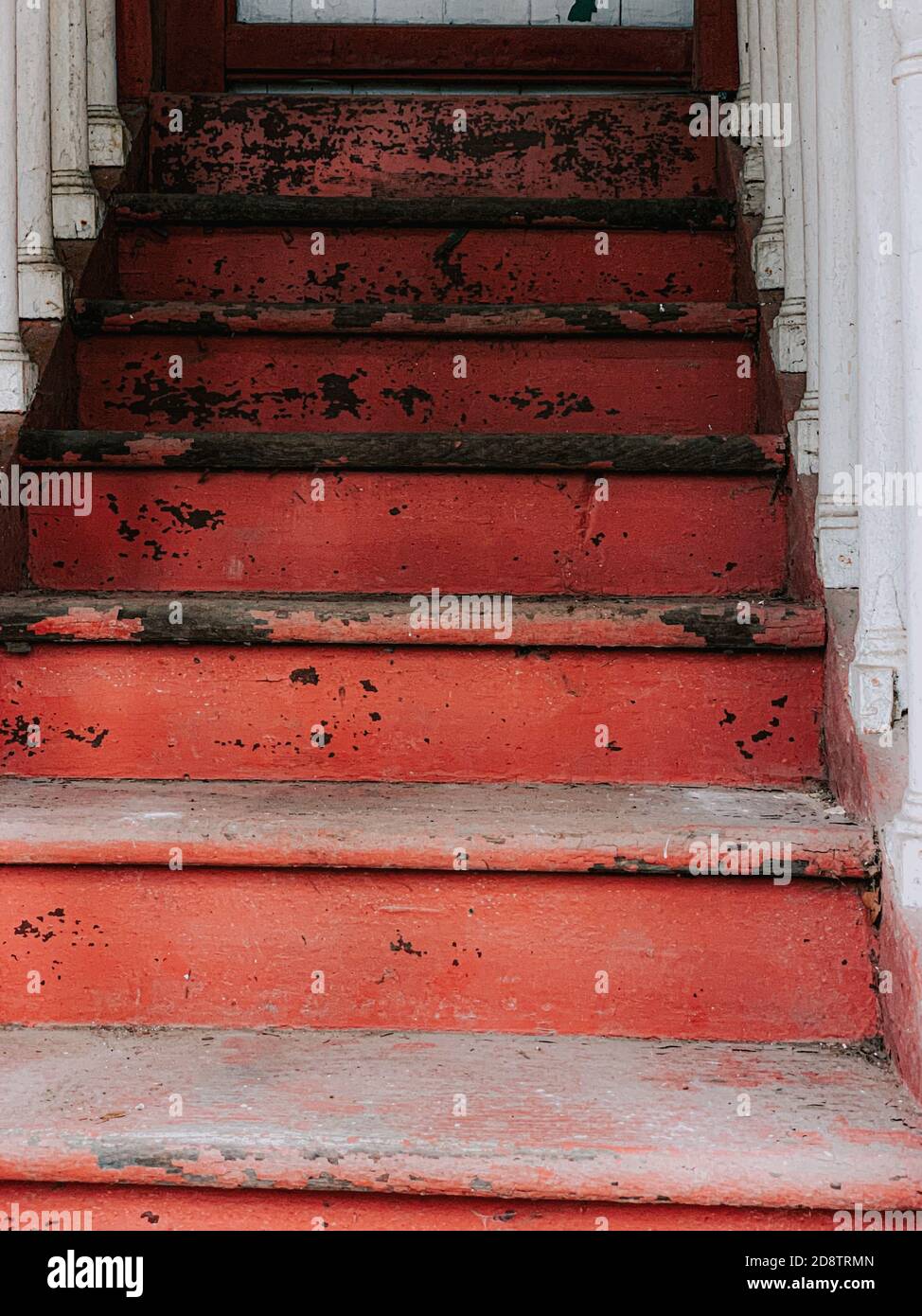 Vertical shot of old dirty red stairs Stock Photo - Alamy