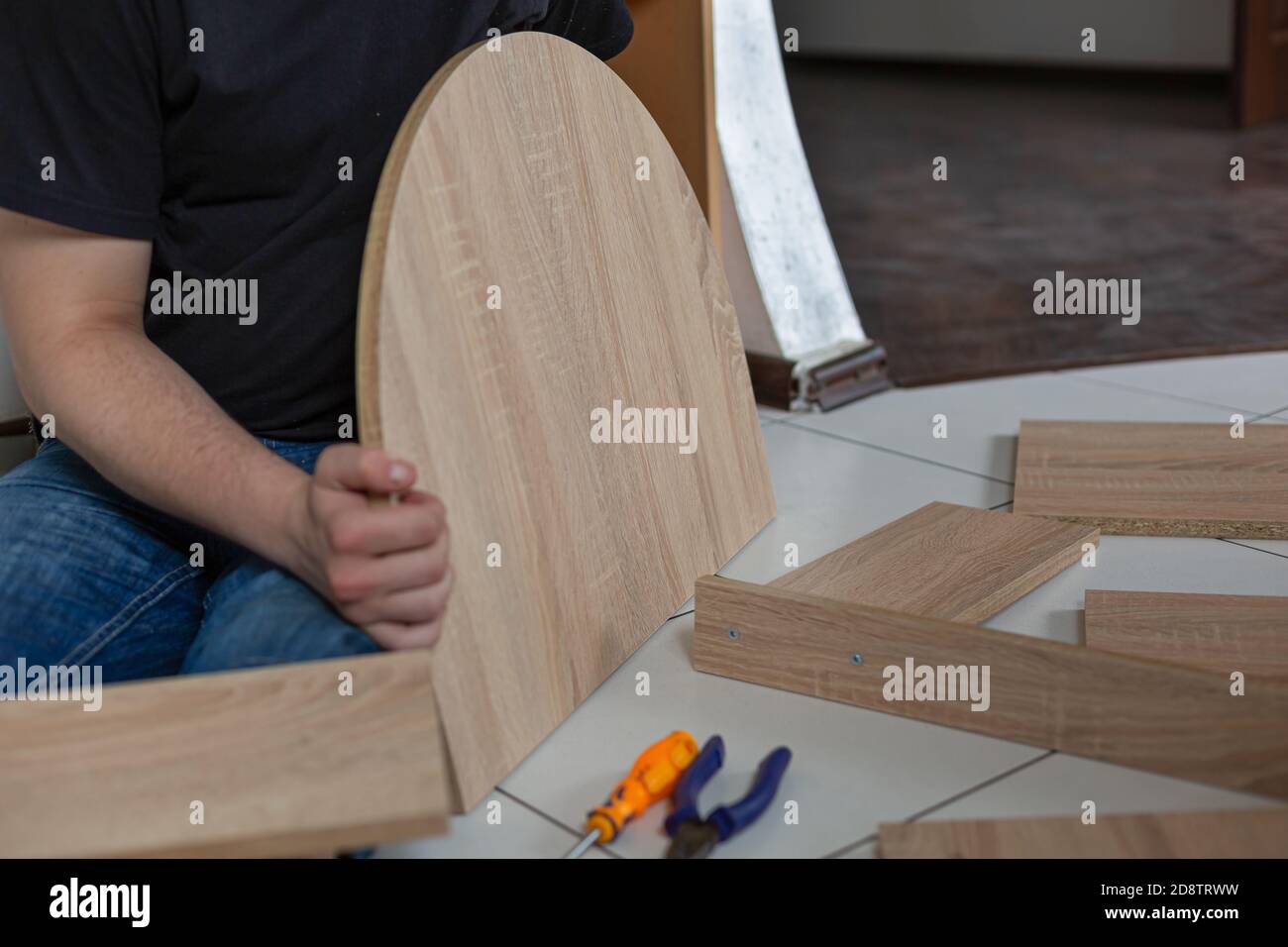Assembling of furniture with his own hands at home, close up Stock ...