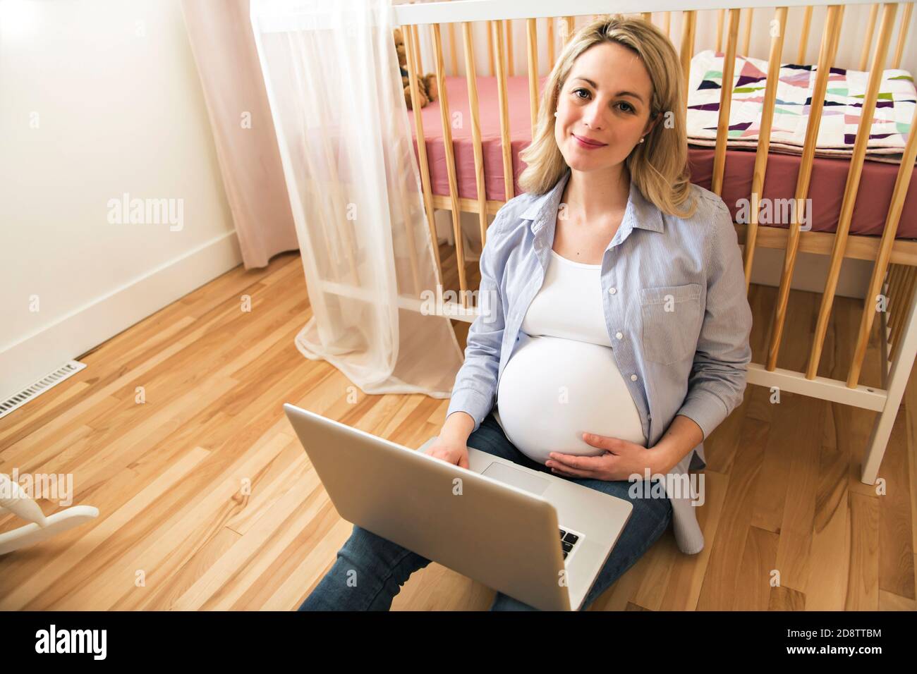 Attractive pregnant woman sitting laptop hi-res stock photography and ...