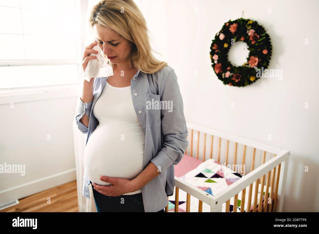 Pregnant woman crying hi-res stock photography and images - Alamy