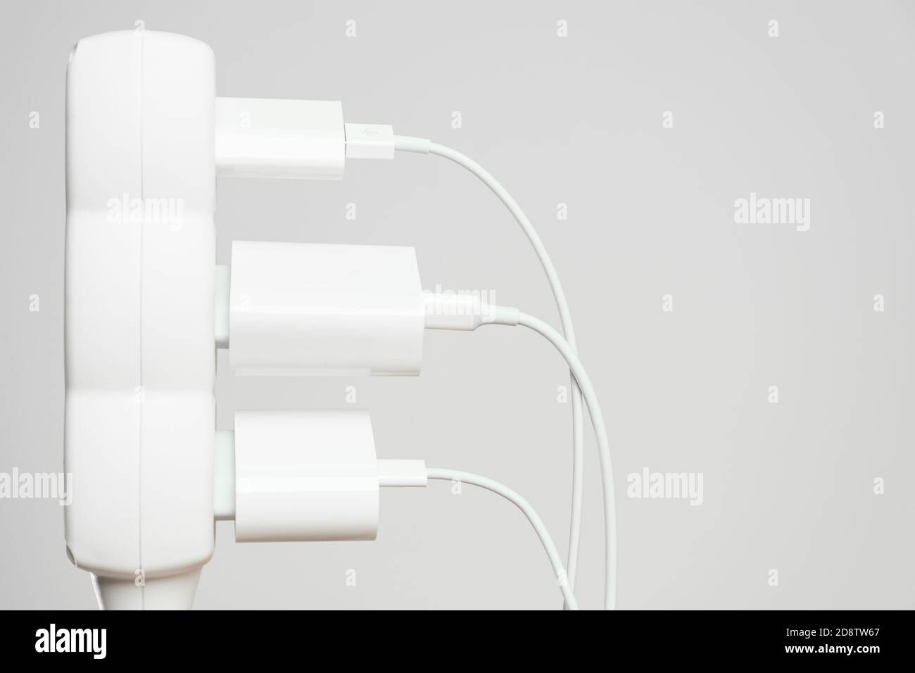 Indoor white office extension cord with three white connected to it ...