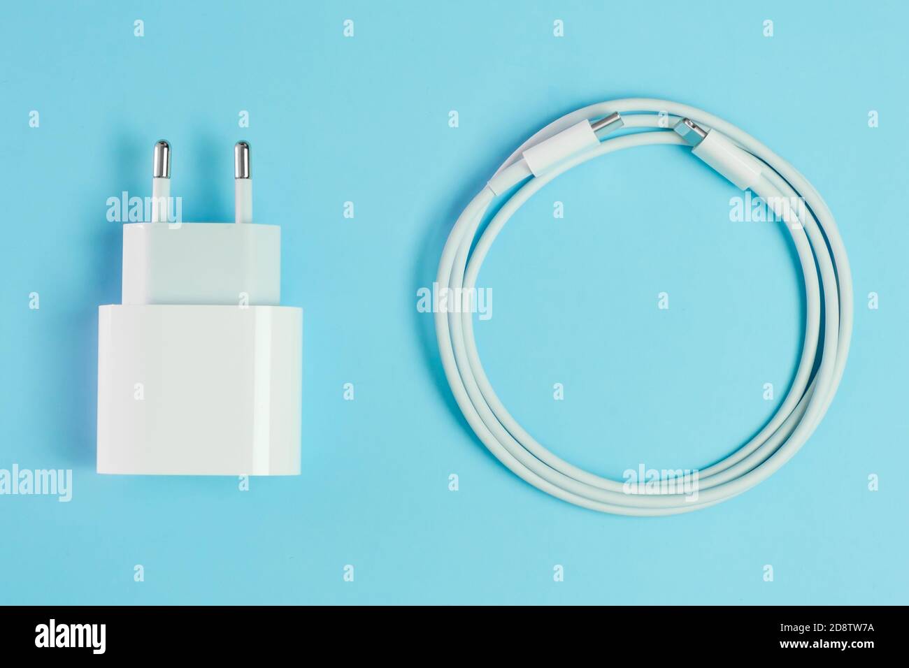 A white smart phone charger cable with lightning hi speed USB A ...