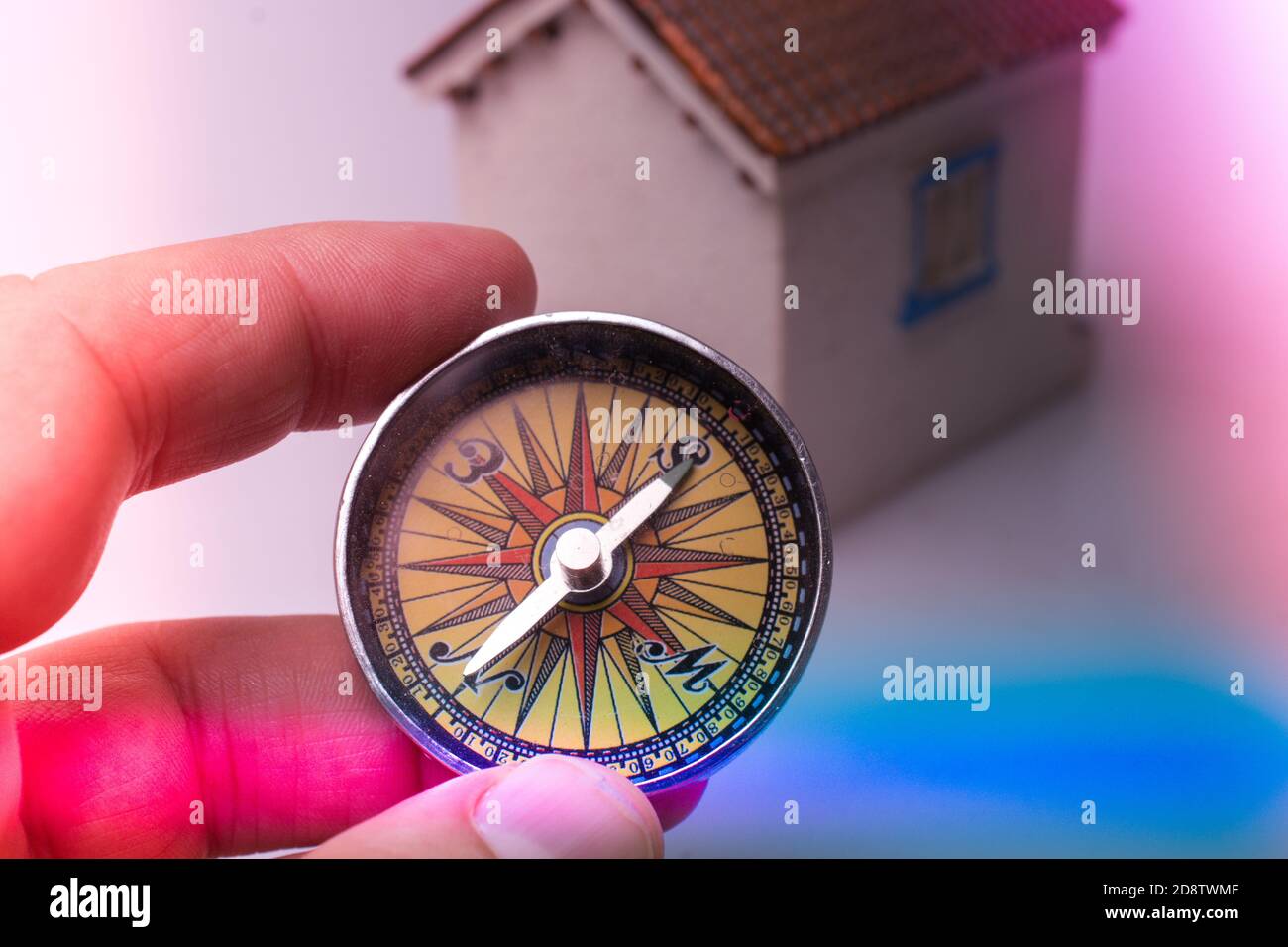Compass tool in hand o as travel concept Stock Photo - Alamy