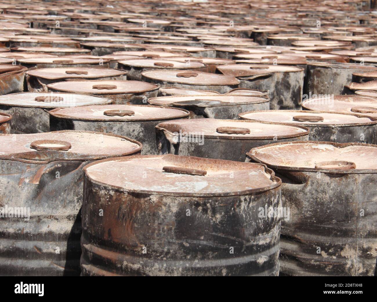 old fuel tanks that lay altogether Stock Photo - Alamy