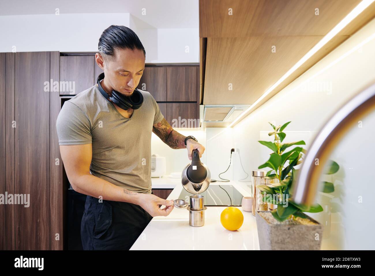 Man making Vietnamese style coffee Stock Photo - Alamy