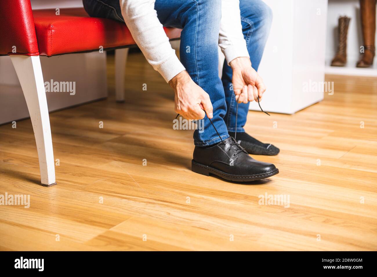 Man choosing shoes hi-res stock photography and images - Alamy