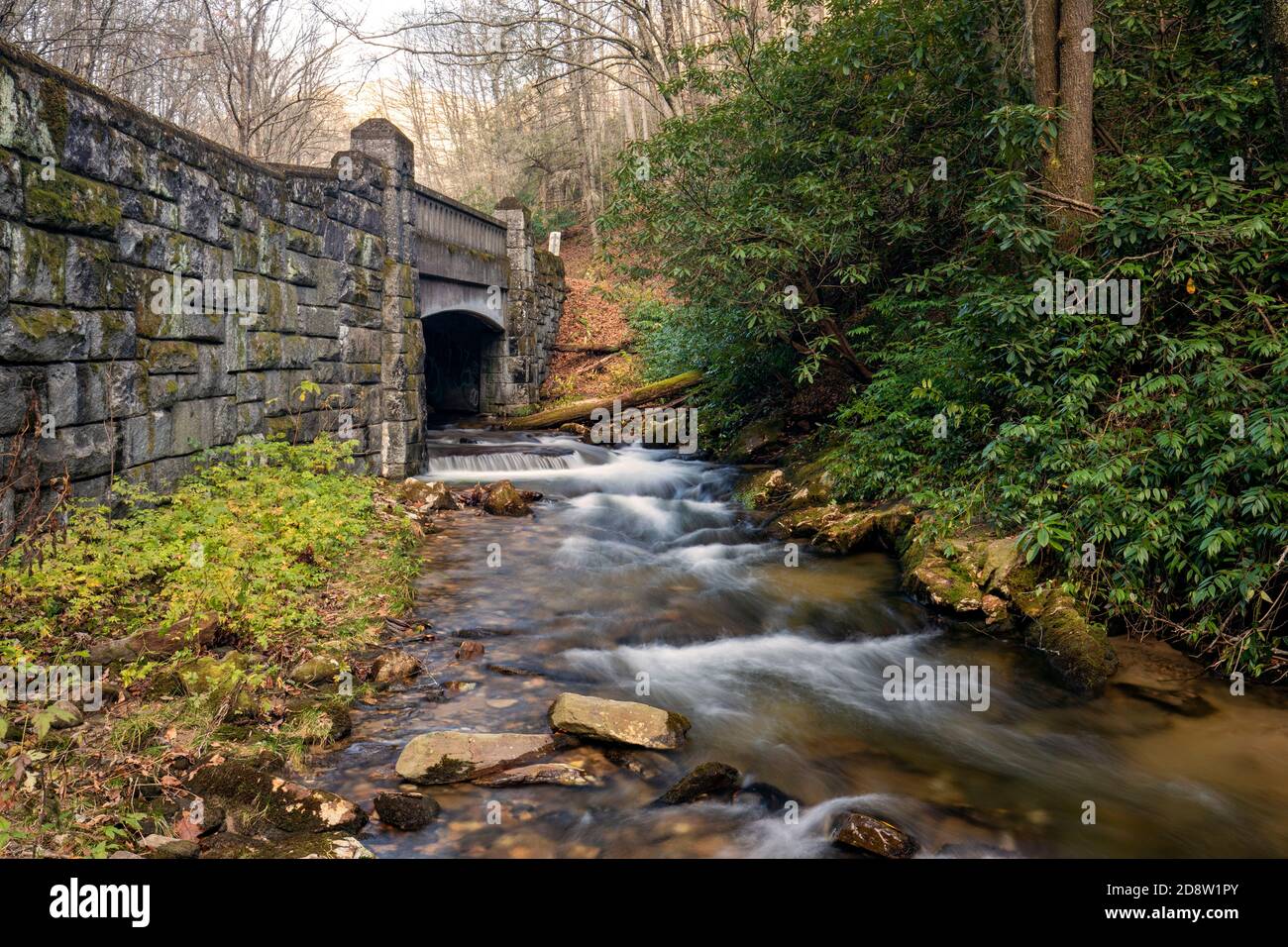 Cascade flowing under stone bridge in Pisgah National Forest - near ...