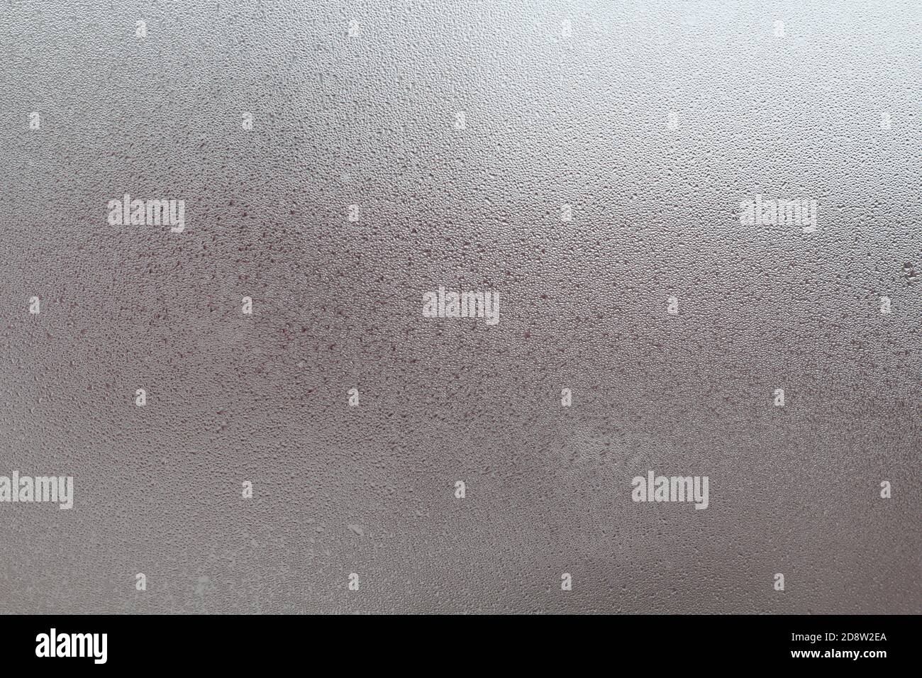 Wet window glass closeup. Glass with drops of water. Foggy window in ...