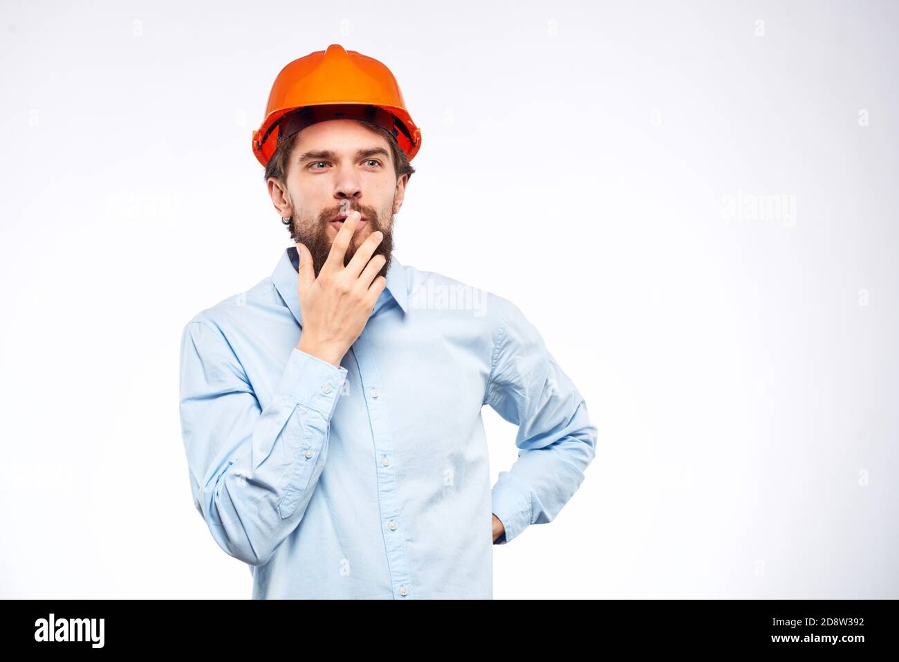 Worker man in orange paint engineer emotions industry construction ...