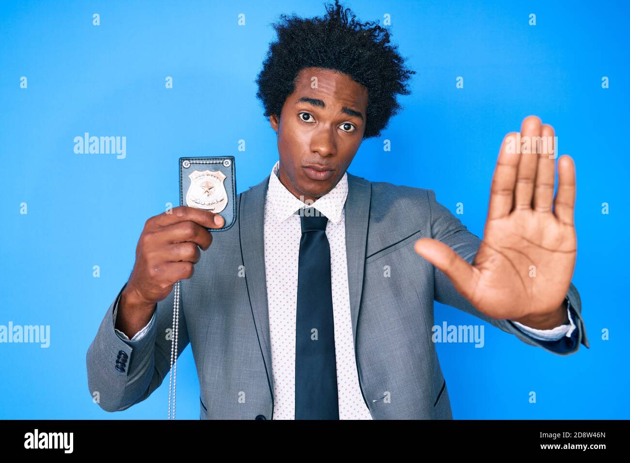 Police detective showing badge hi-res stock photography and images - Alamy