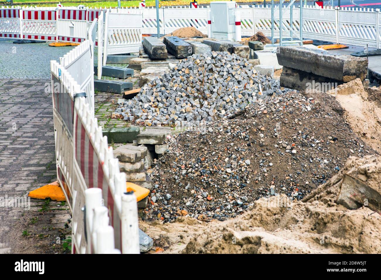 Close-up of a road construction site with cobblestones Stock Photo - Alamy
