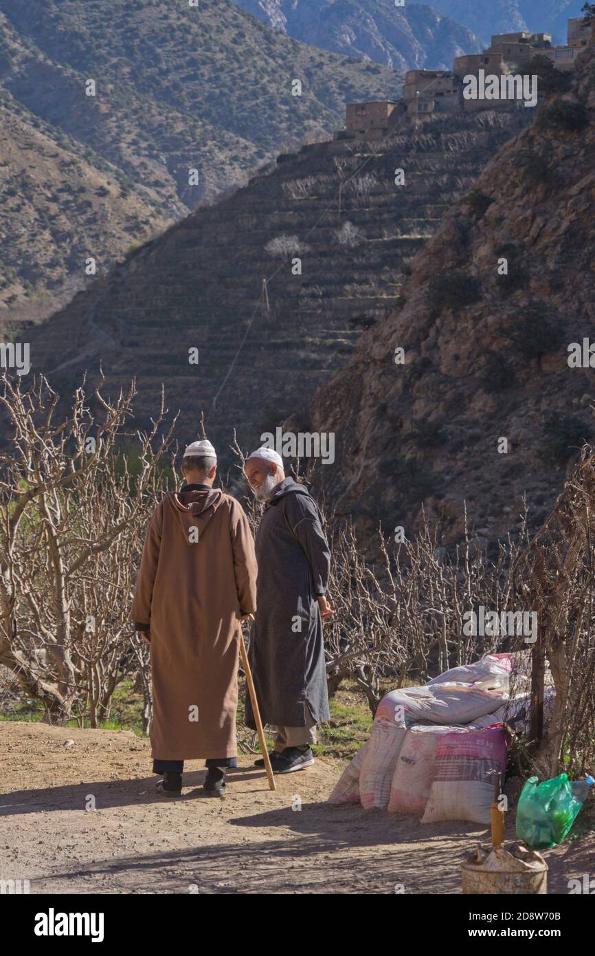 Local people talking at a village in the High Atlas mountains, Morocco ...