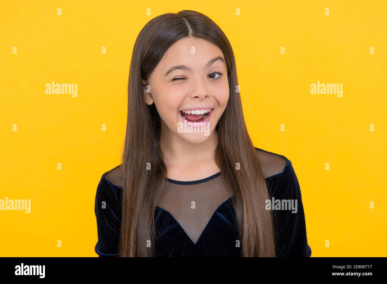 Happy little girl child smile winking with open mouth and showing ...