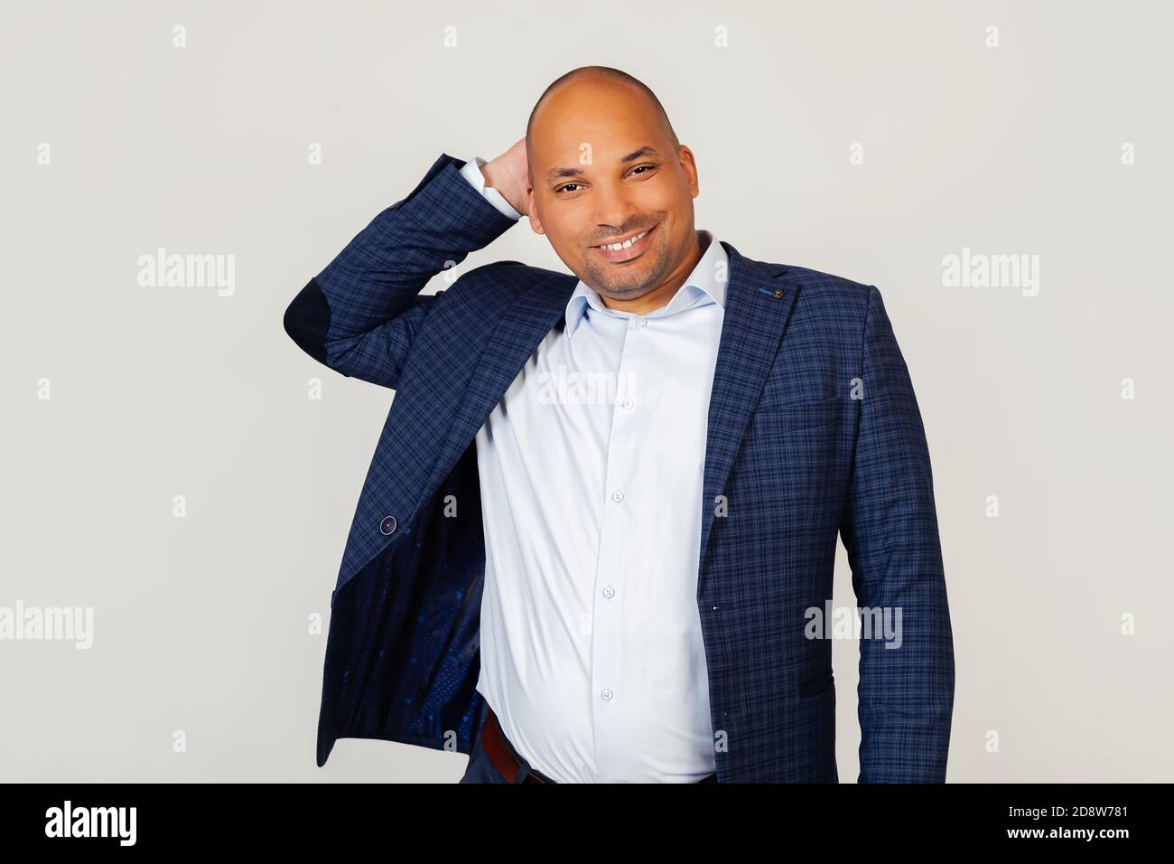 Portrait of a brooding young African American businessman guy ...