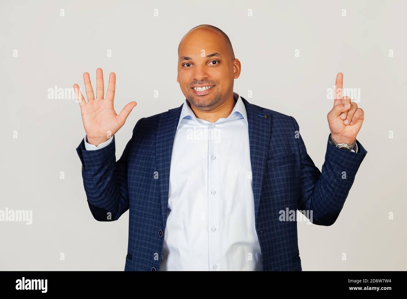 Portrait of successful young African American businessman guy, showing ...