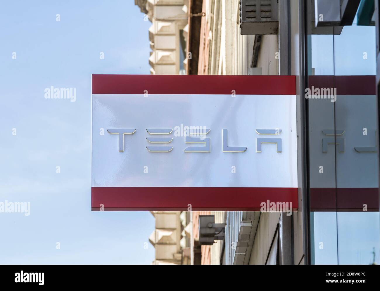 Hamburg, Germany, May 11, 2019: Tesla Motors logo sign on the showroom ...
