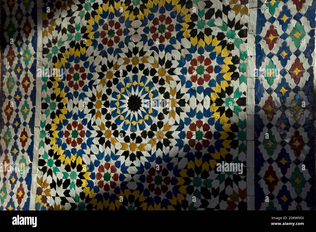 Arabesque details in a tiled wall by the souks of the medina old town ...