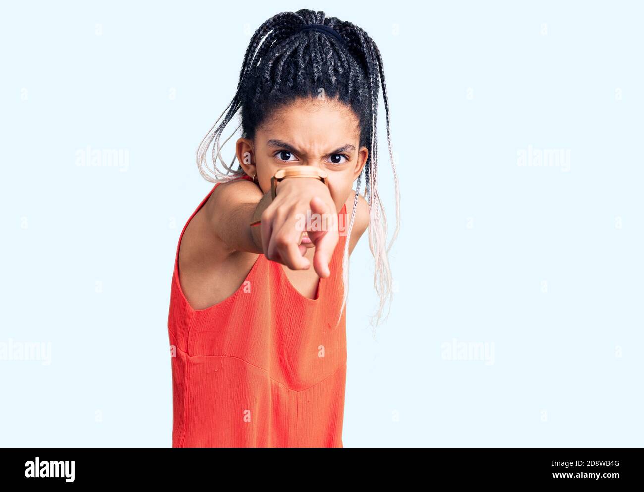 Cute african american girl wearing casual clothes pointing displeased ...