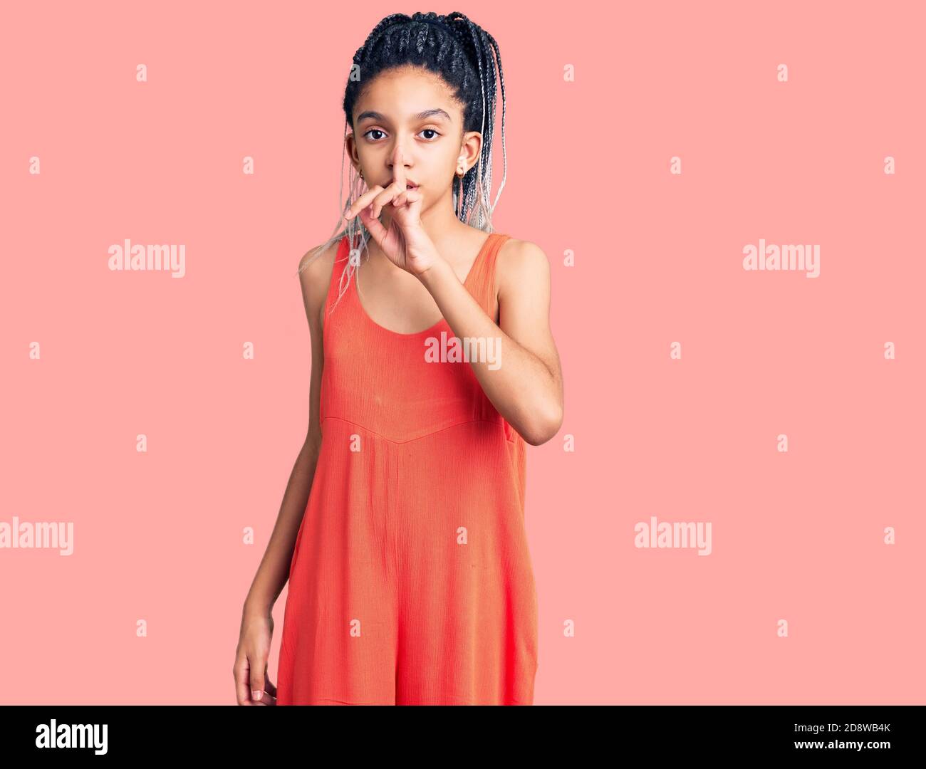 Cute african american girl wearing casual clothes asking to be quiet ...