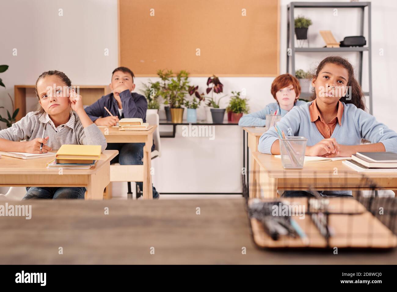 Children listening classroom uniform hi-res stock photography and ...