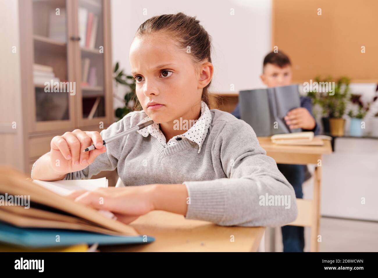 Childhood sitting education student learning hi-res stock photography ...