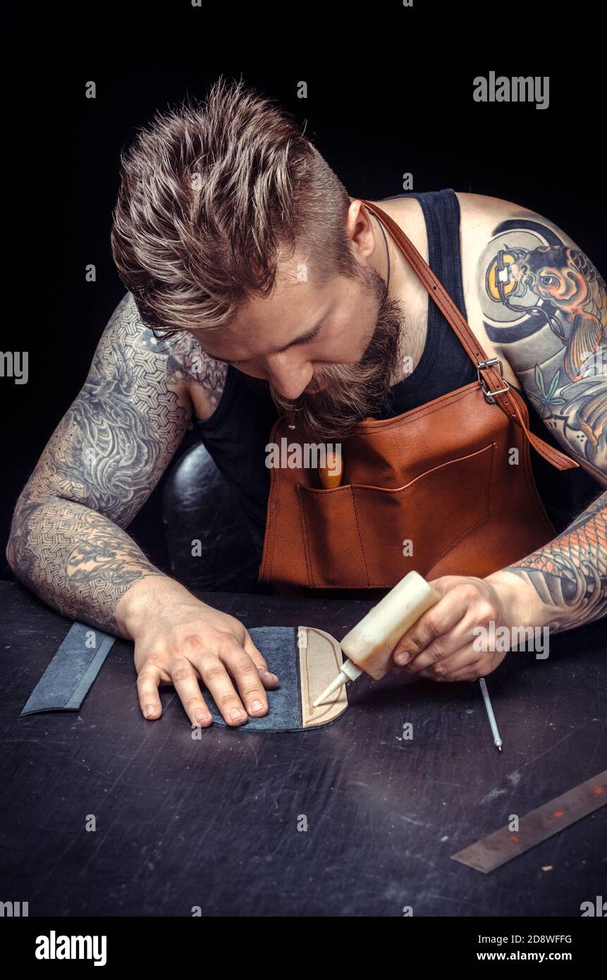 Worker leather producing workpiece hi-res stock photography and images ...