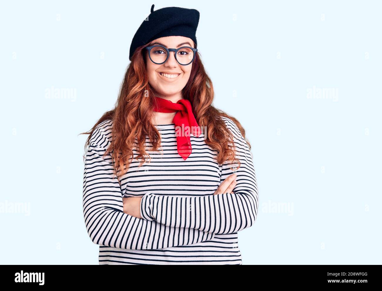 Young beautiful woman wearing french look with beret happy face smiling ...