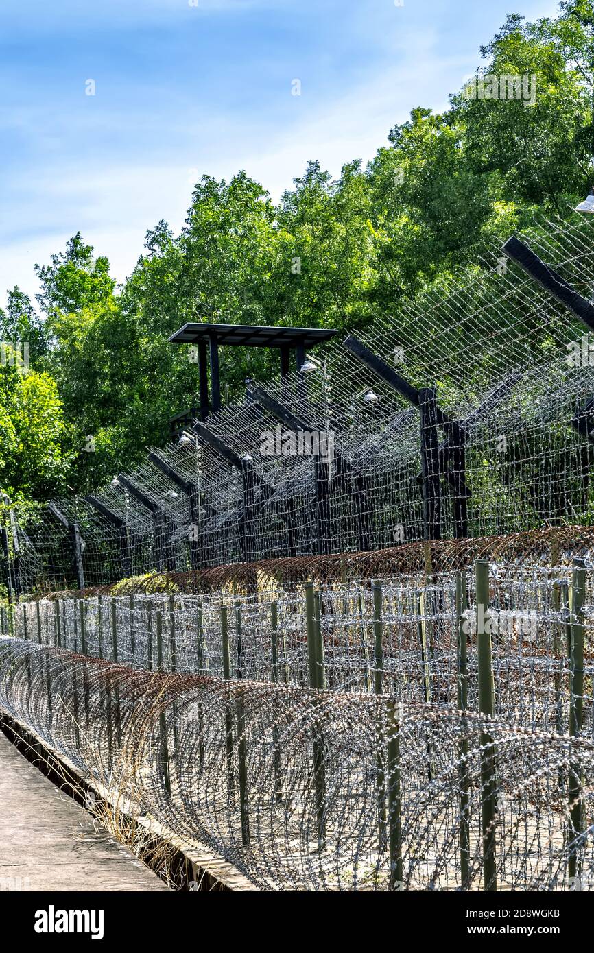 Prison guard. Barbwire secure border engineering protection fence is ...
